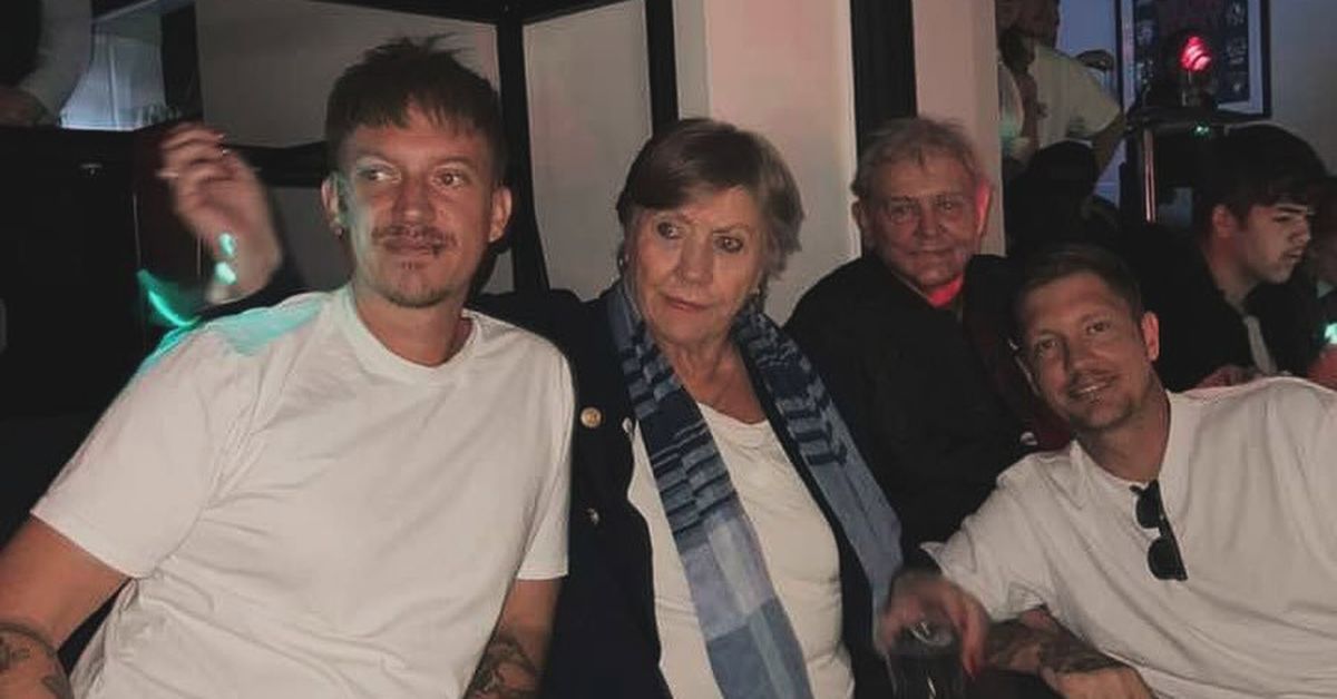 John Farnham makes rare public appearance with family at Coldplay ...