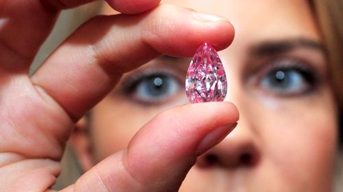 Ultra-rare vivid pink diamond sells for over $20 million in record Hong ...