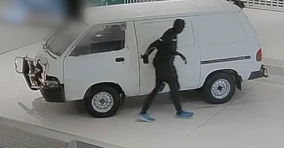 Men sought after vans drive into shopping centre