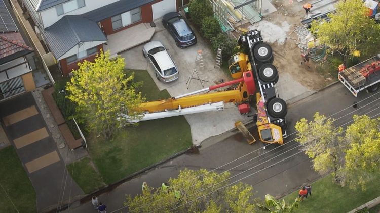 Padstow Heights: Crane flips on quiet Sydney street