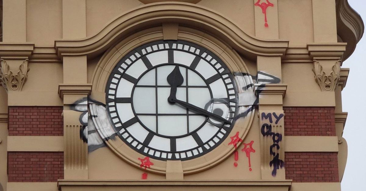 Mystery graffiti on iconic heritage-listed clock tower