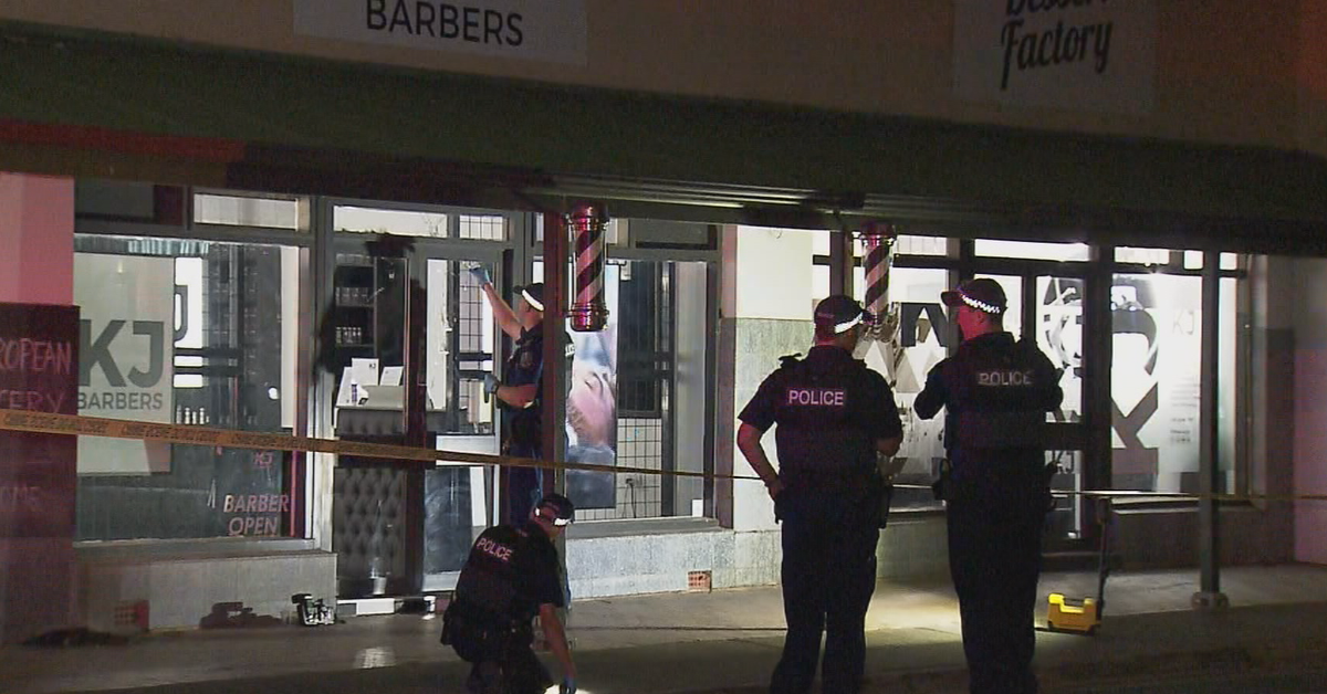 Adelaide barber's shop sprayed with bullets in drive-by shooting