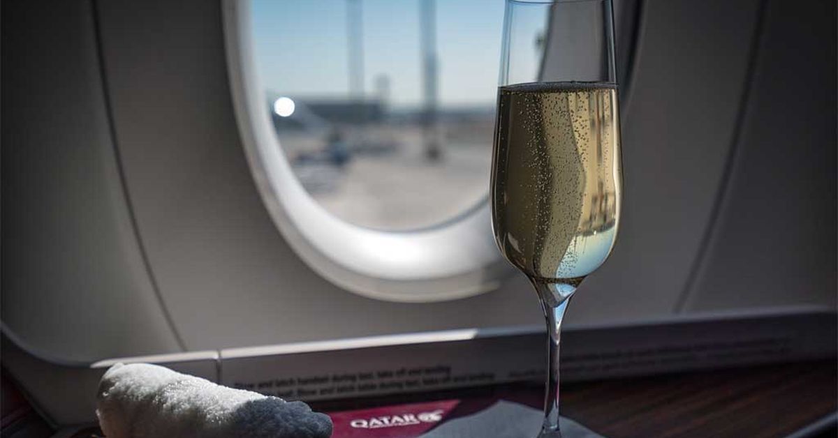 How to fly business class on an economy fare - 9Travel