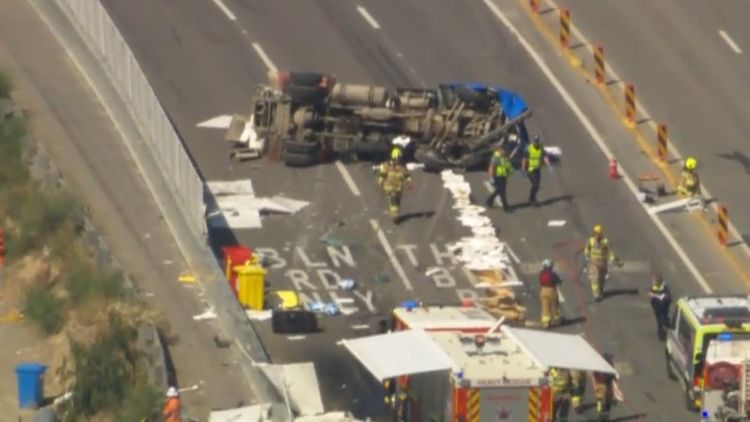 Eastern Freeway crash: Driver killed after cement truck crashes, rolls ...