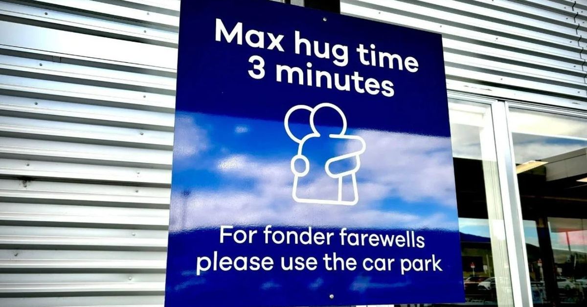 Airports respond to three-minute hug sign in New Zealand after it got ...